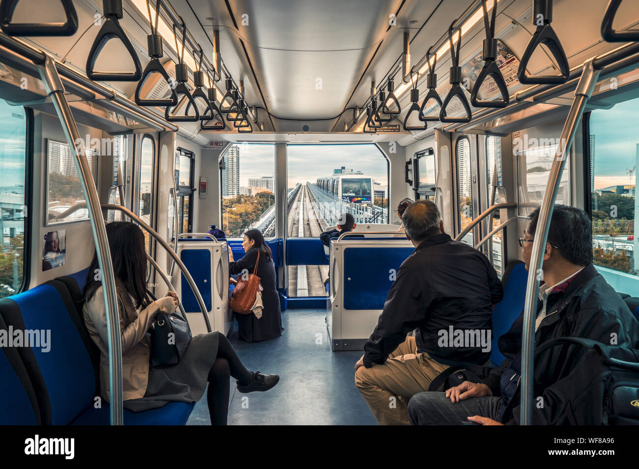Group sitting of rail hi-res stock photography and images - Alamy