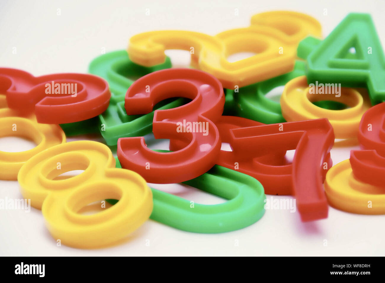 Close-up Of Colorful Numbers On White Background Stock Photo - Alamy