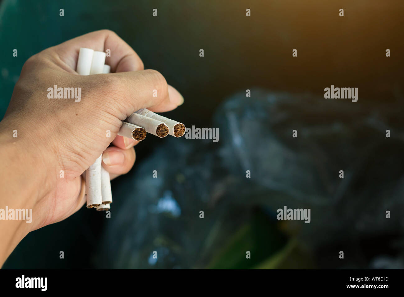 Throwing cigarettes hi-res stock photography and images - Alamy