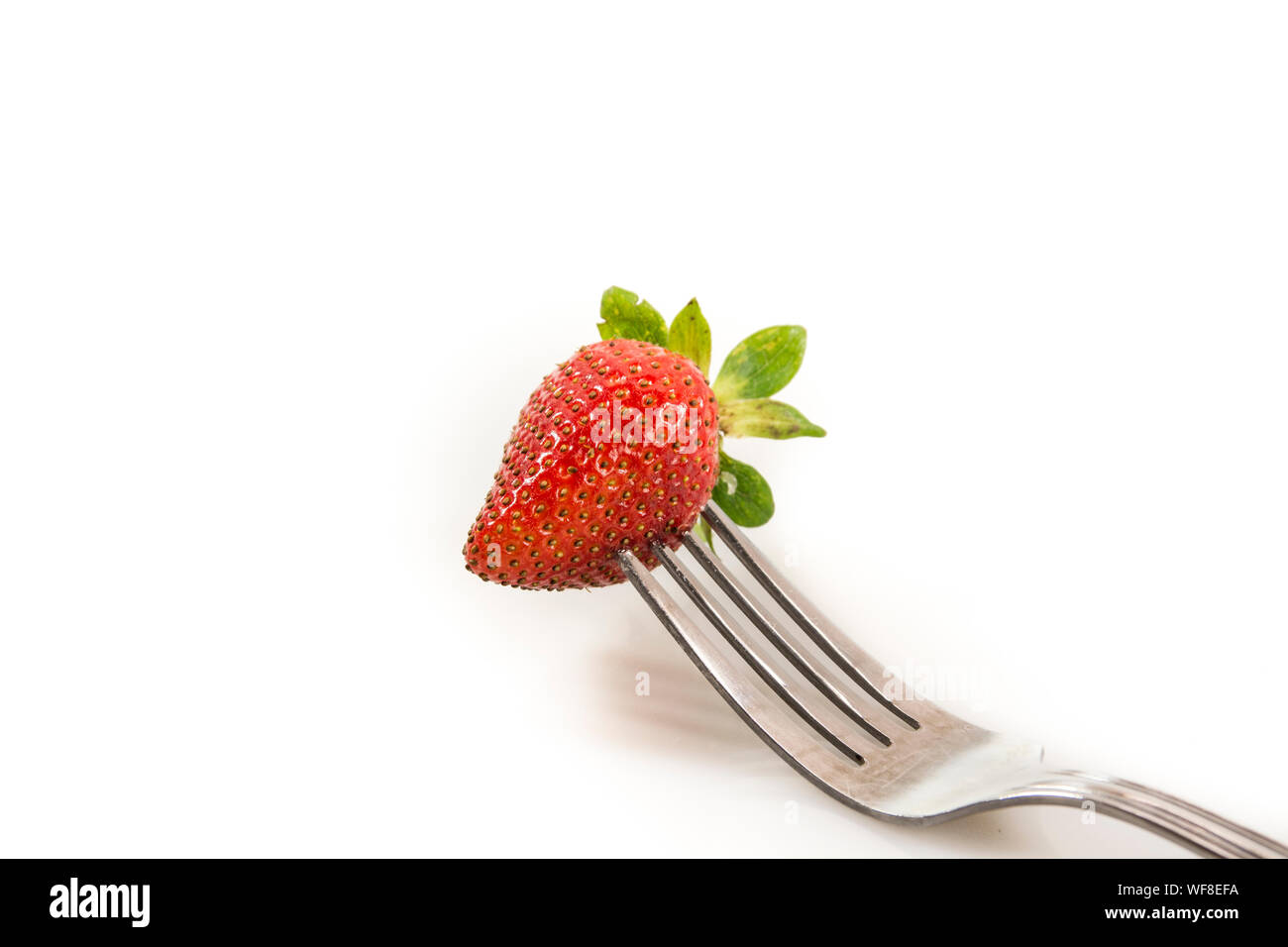Fork strawberry hi-res stock photography and images - Alamy