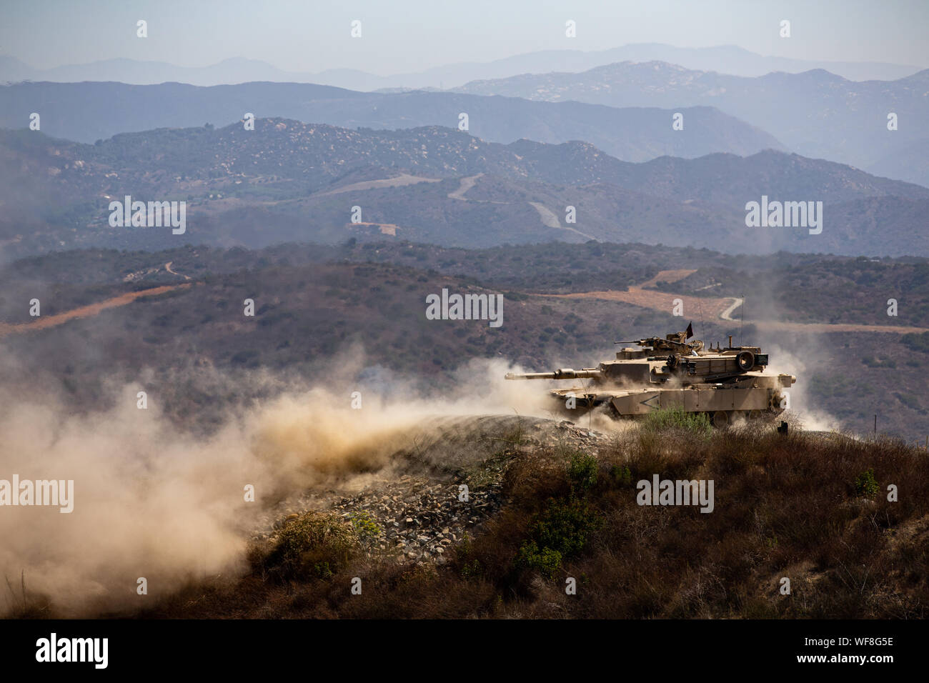 An M1A2 Abrams Main Battle Tank fires during the Tank Gunnery ...