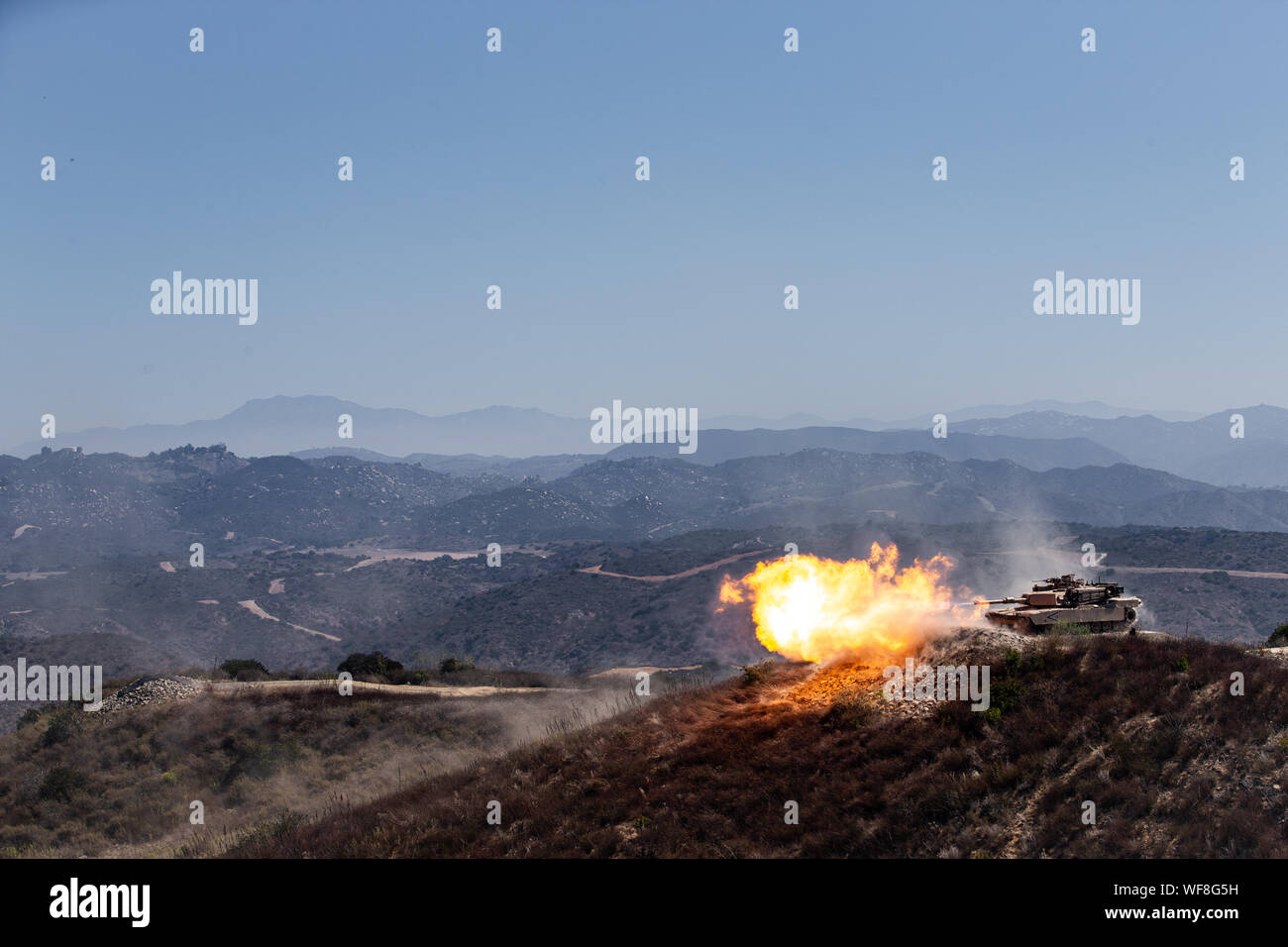 An M1A2 Abrams Main Battle Tank fires during the Tank Gunnery ...
