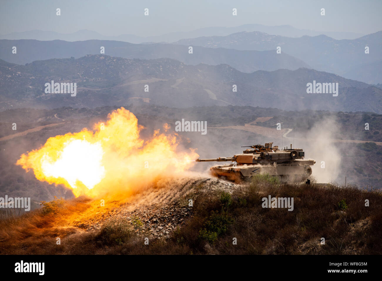 An M1A2 Abrams Main Battle Tank fires during the Tank Gunnery ...