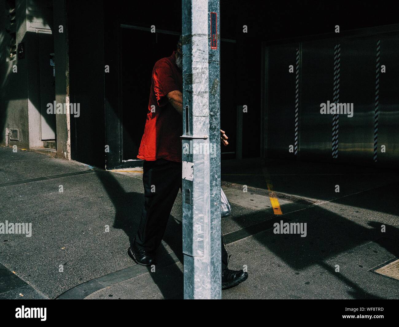 Person walking street hi-res stock photography and images - Alamy