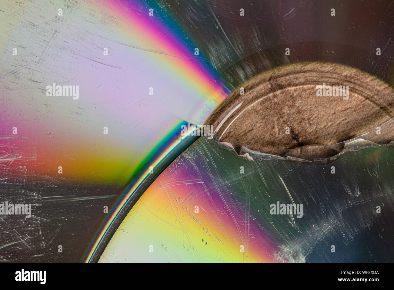 Broken and damaged optical disk storage data Stock Photo - Alamy