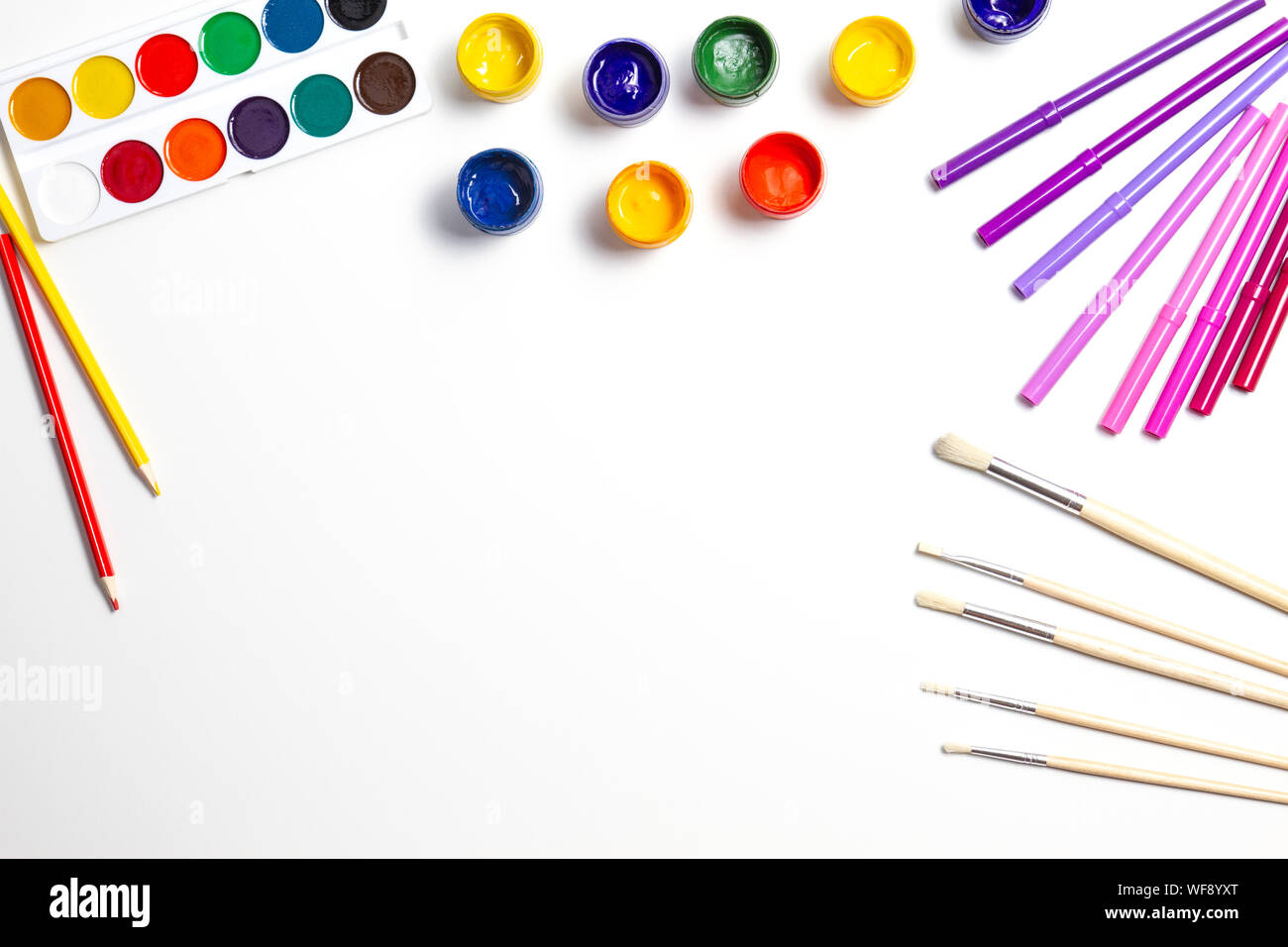 Creative background with art supplies on white background. Top view ...