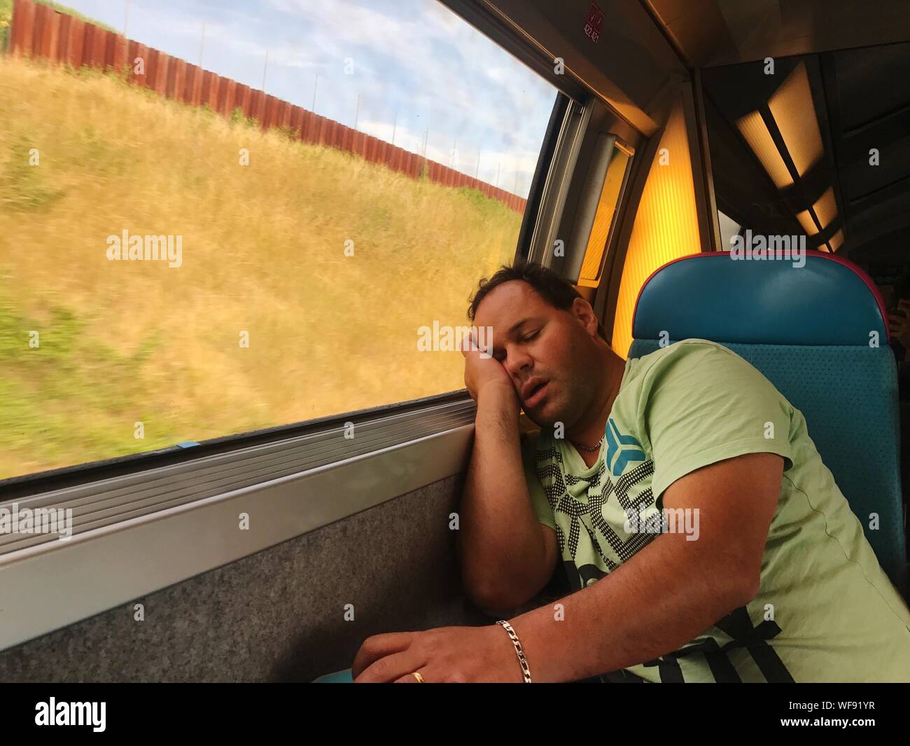 Man sleeping in vehicle hi-res stock photography and images - Alamy