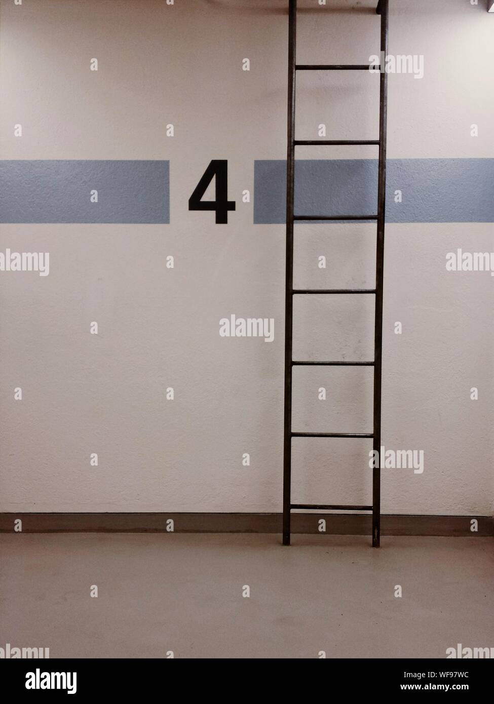 Ladder against hi-res stock photography and images - Alamy