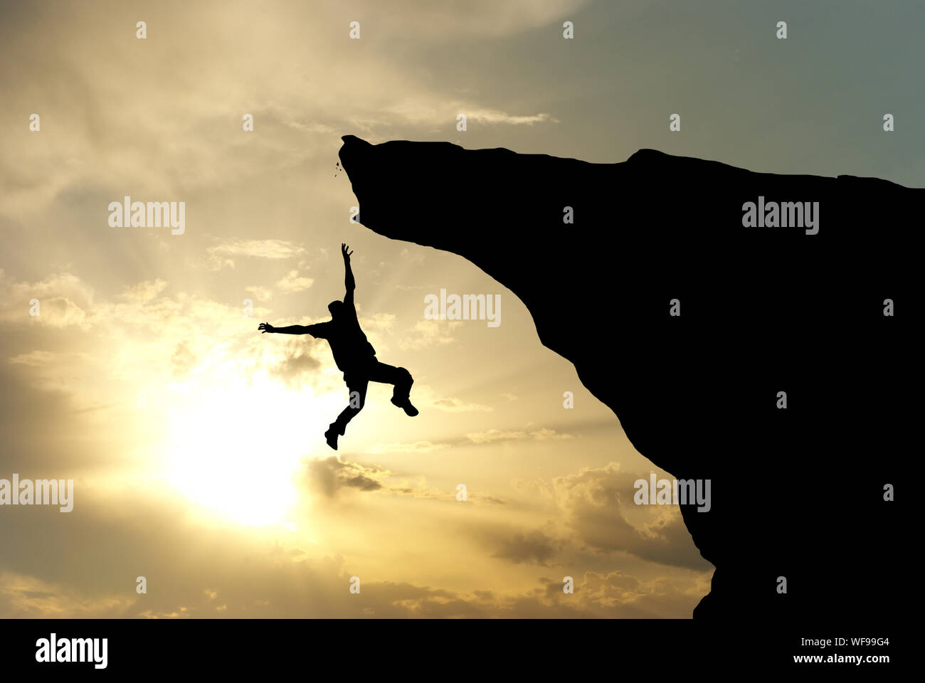 Man falling cliff edge hi-res stock photography and images - Alamy