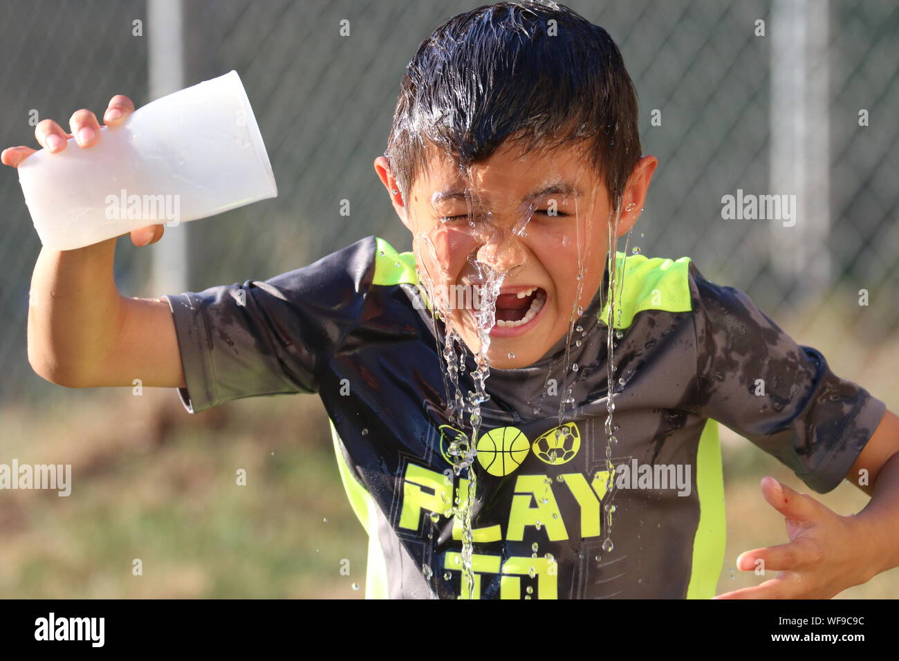 Person Pouring Water On Himself High Resolution Stock Photography and ...