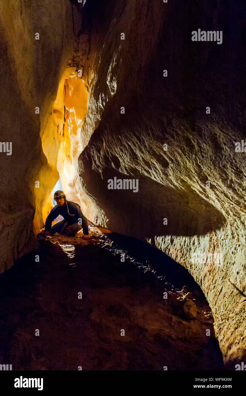 Climbing in cave hi-res stock photography and images - Alamy
