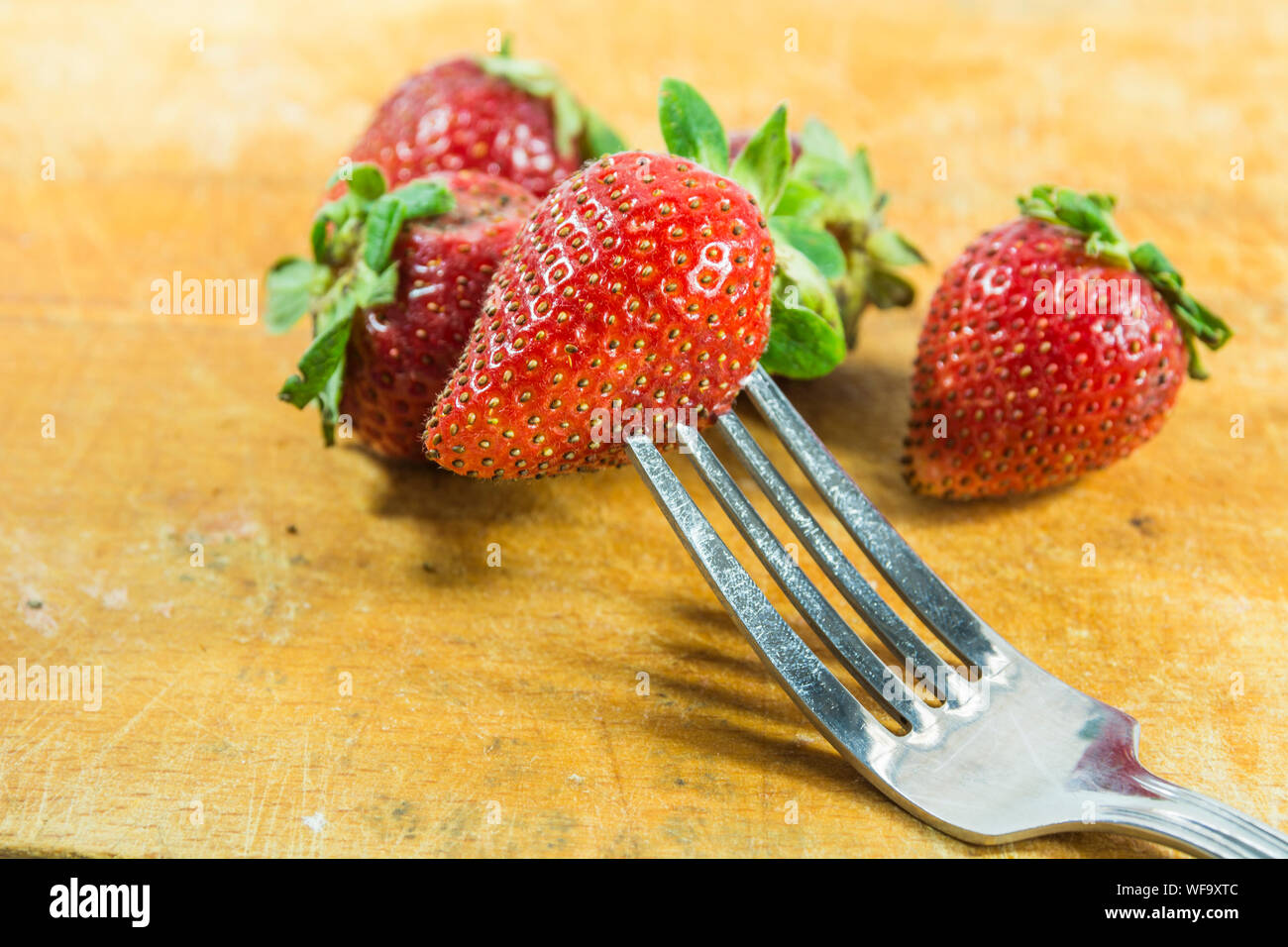 Fork strawberry hi-res stock photography and images - Alamy
