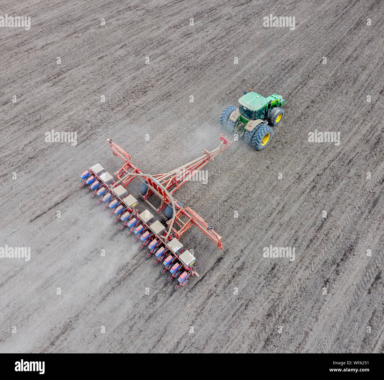 Working on tractor hi-res stock photography and images - Alamy