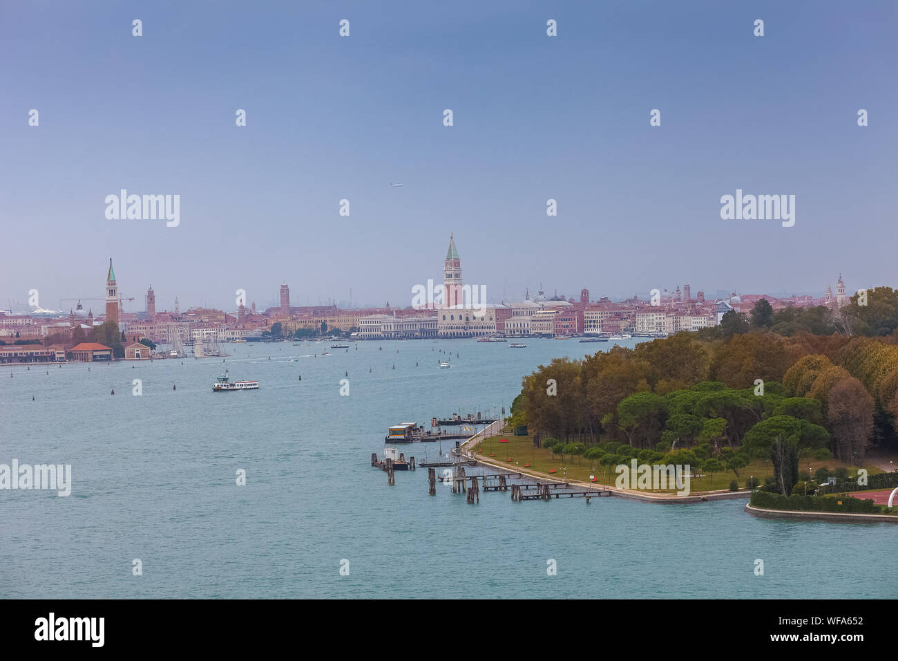 Autumn-colored trees with San Marco and Canal Grande background, Venice ...