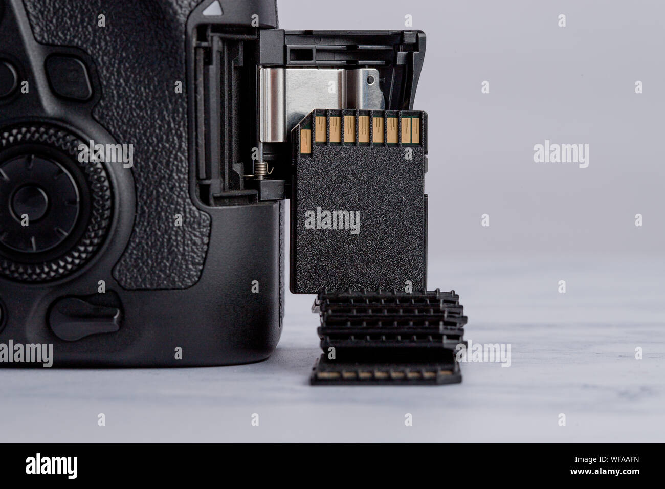 Professional Photography Equipment. SD cards next to DSLR Camera Stock ...