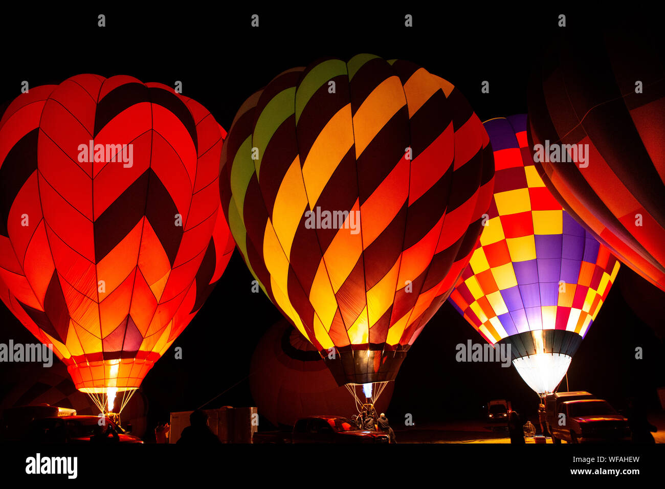 Hot air balloons at night Stock Photo - Alamy