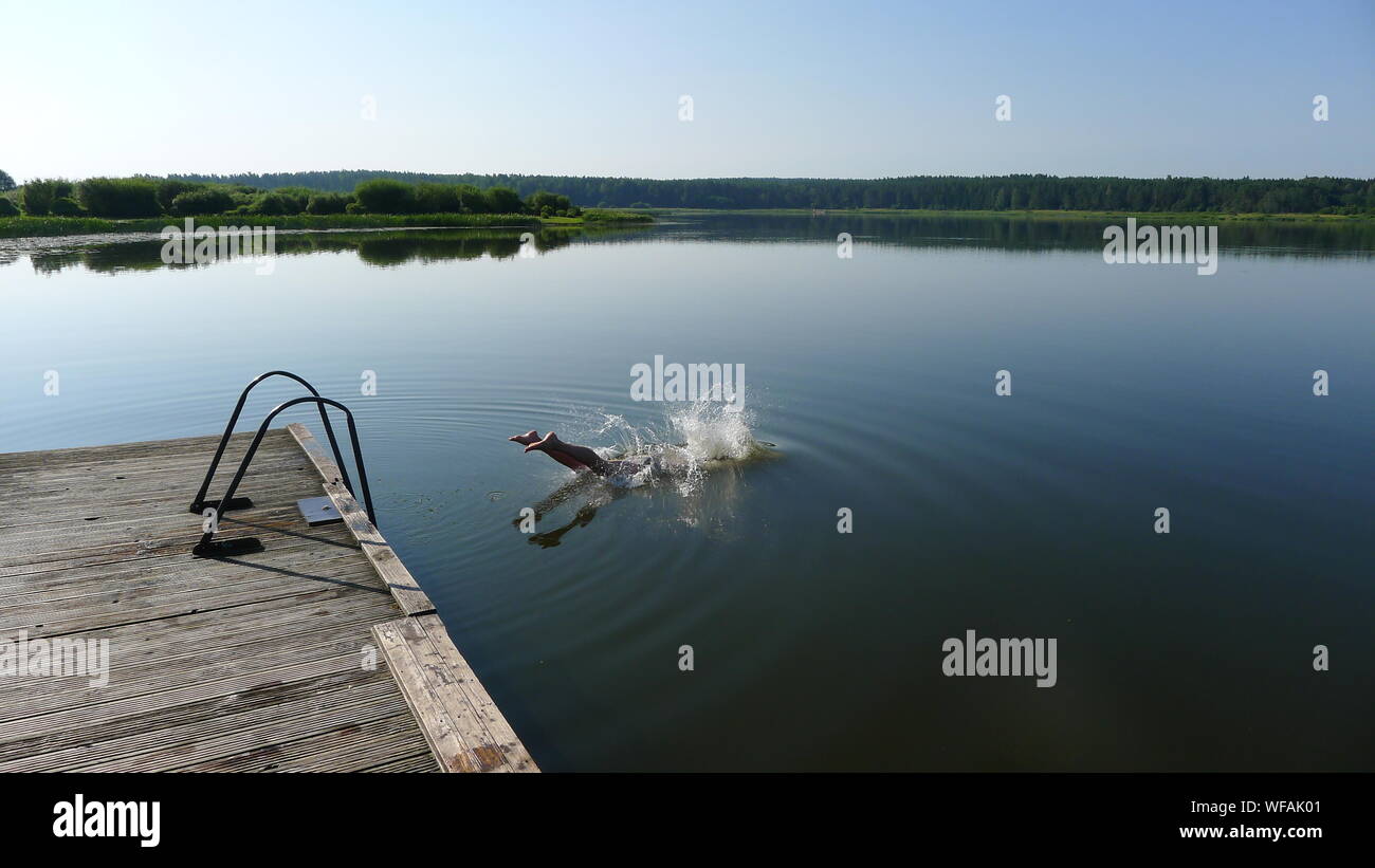 Diving low hi-res stock photography and images - Alamy