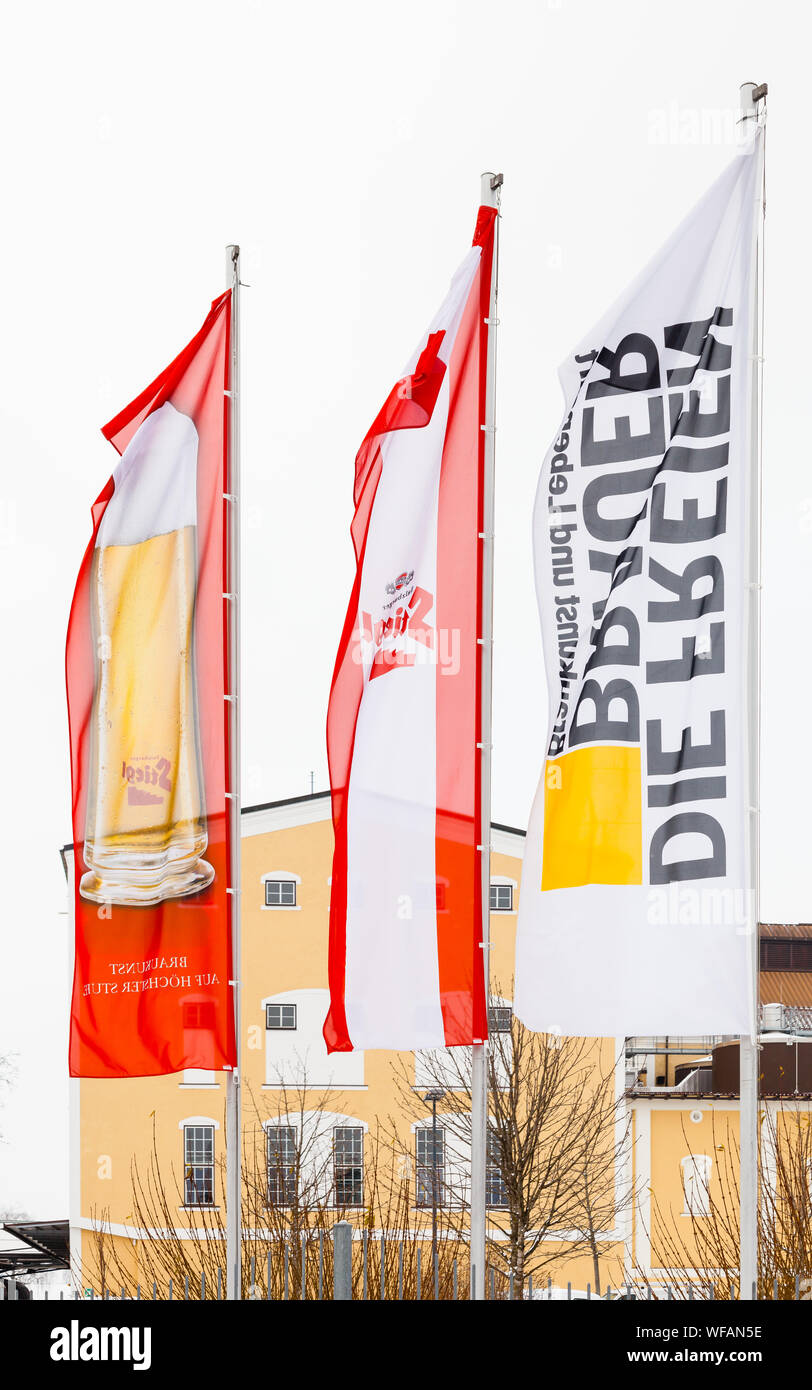 Flags welcome visitors to Stiegl brewery in Salzburg, Austria. Stiegl ...