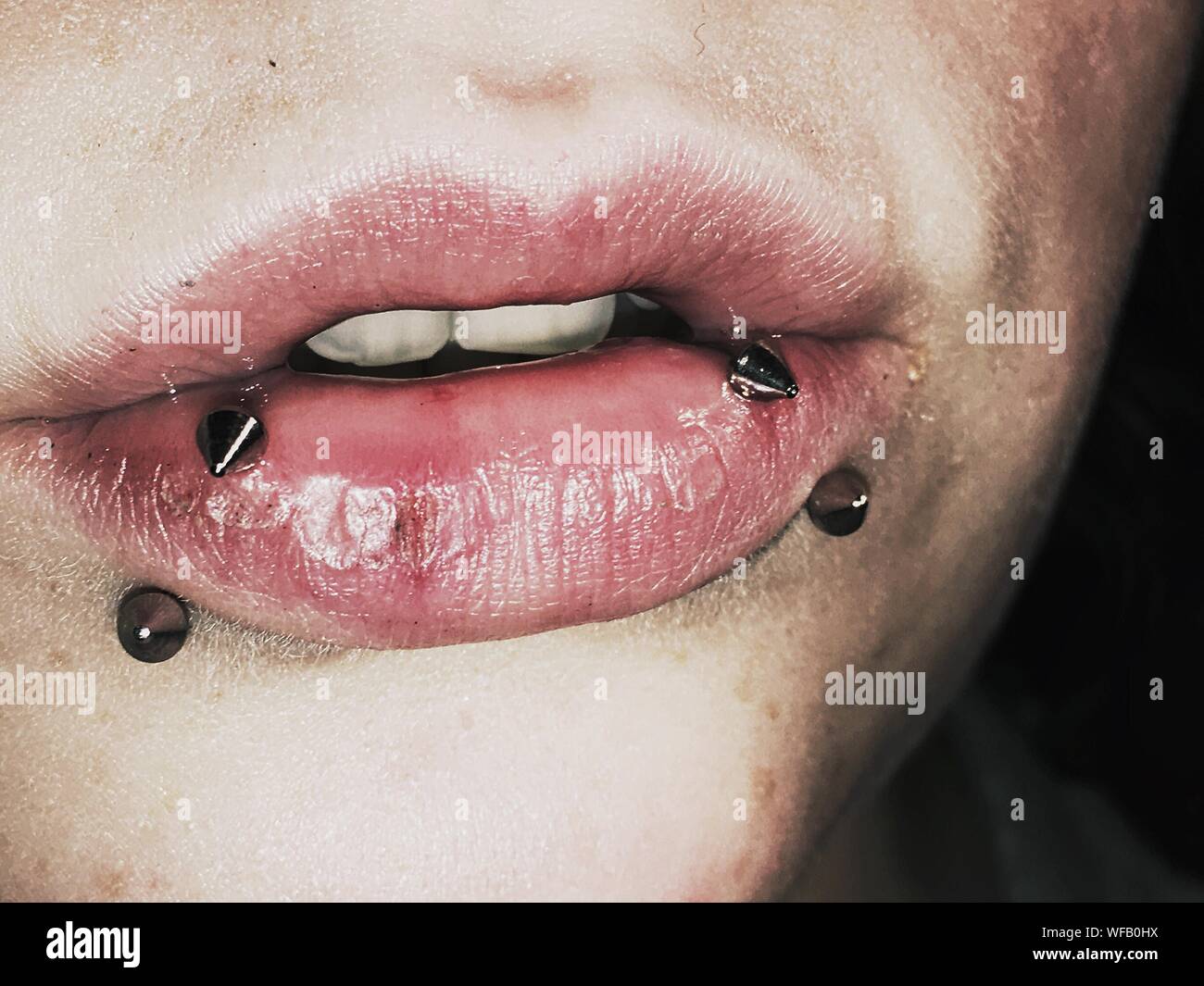 Woman pierced hi-res stock photography and images - Alamy