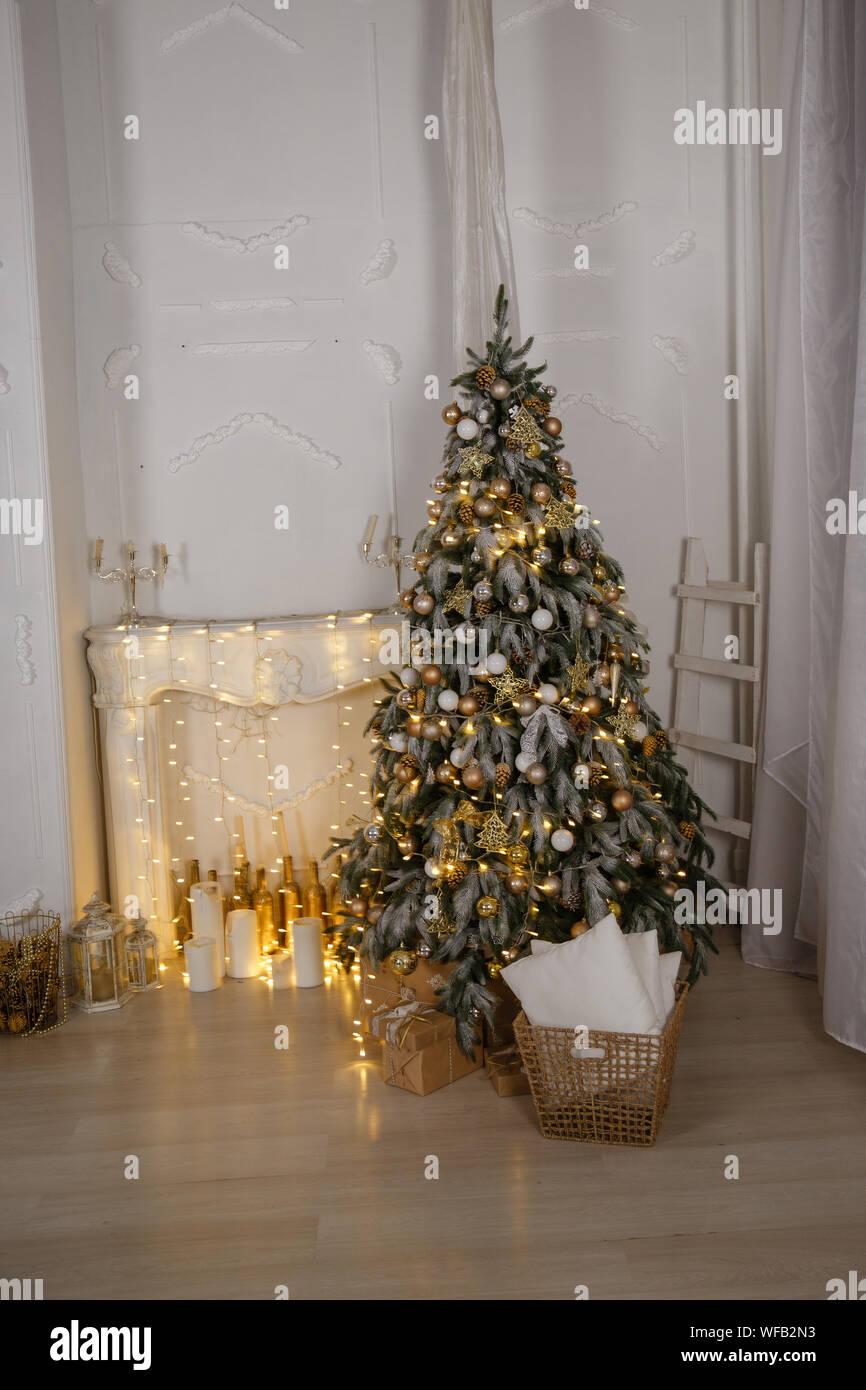 Decorated Christmas tree with various gifts. Christmas and New Year ...