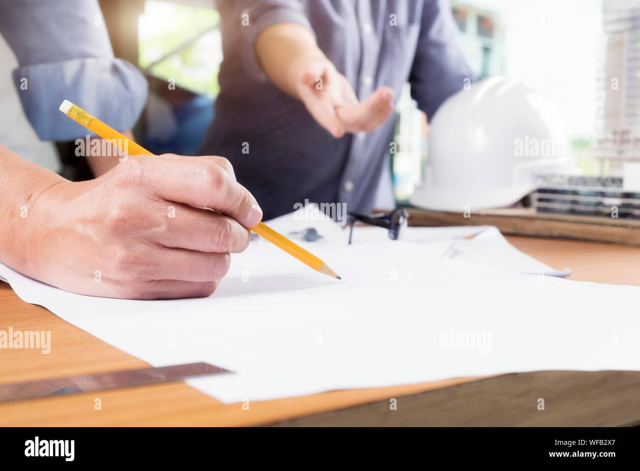 Architect pointing with hand hi-res stock photography and images - Alamy