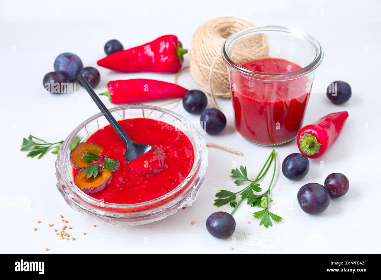 Spicy plum red pepper sauce Stock Photo - Alamy