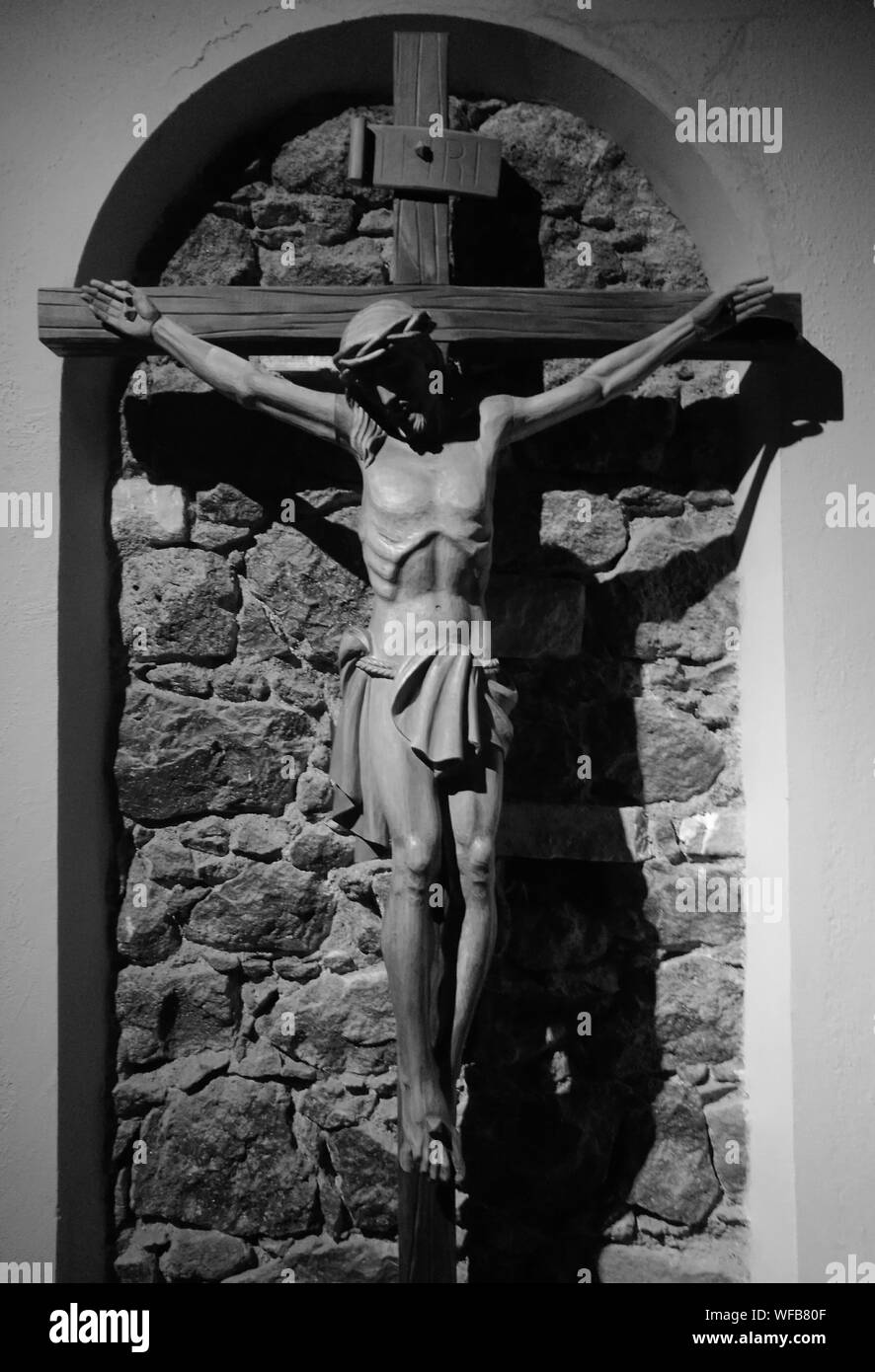 Jesus christ statue outside church Black and White Stock Photos ...