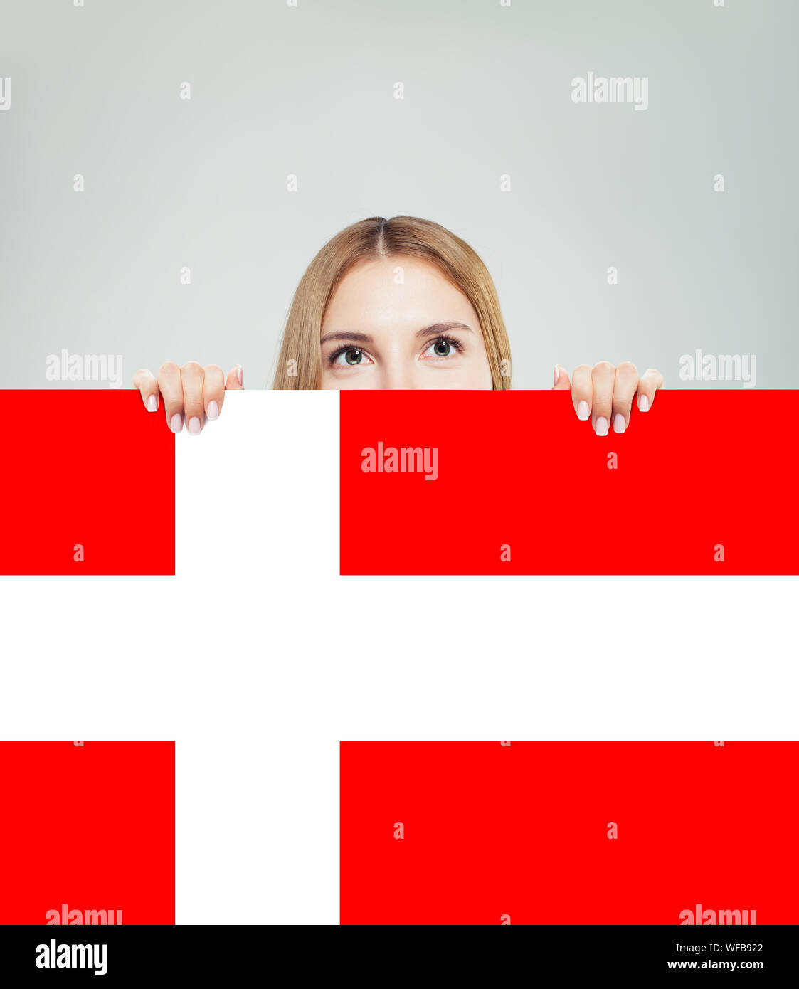 Travel and learn danish language concept. Smiling woman student showing ...