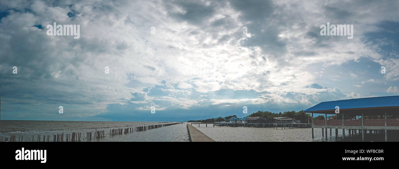 Panorama sea view And a cloudy sky with a beautiful seaside village ...