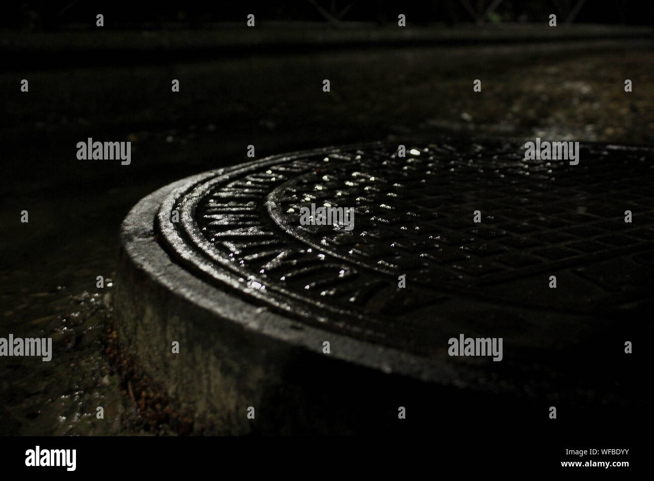 Wet manhole High Resolution Stock Photography and Images - Alamy