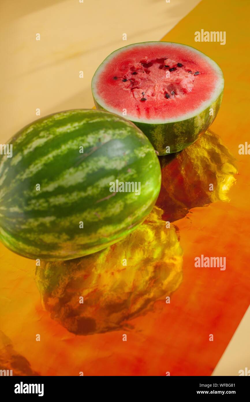 Reflection of a watermelon on holographic foil Stock Photo - Alamy