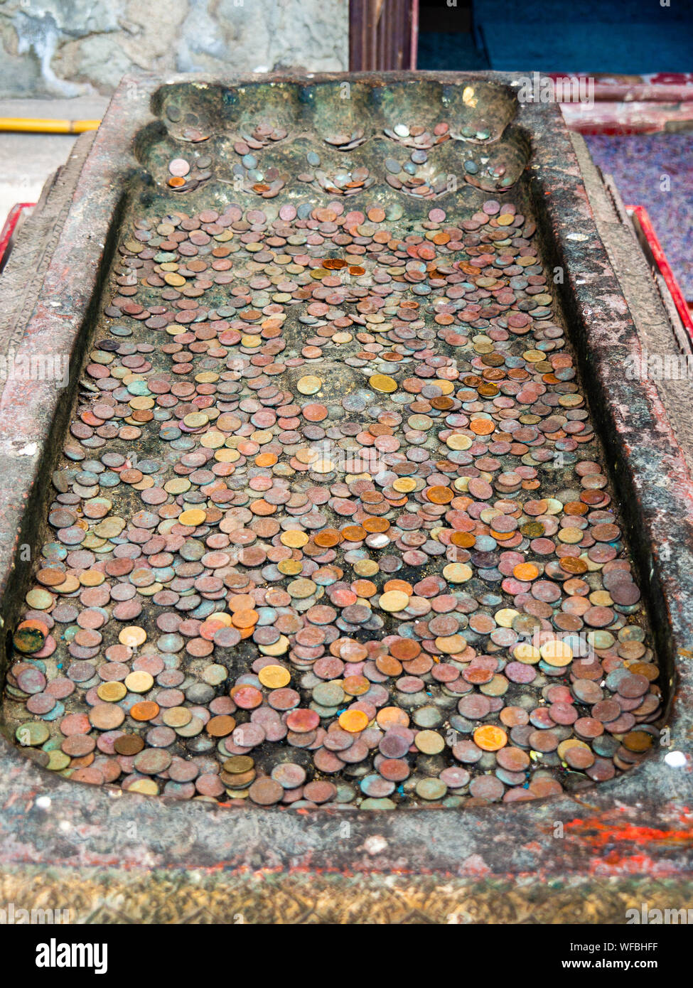Coins a buddhist temple hi-res stock photography and images - Alamy