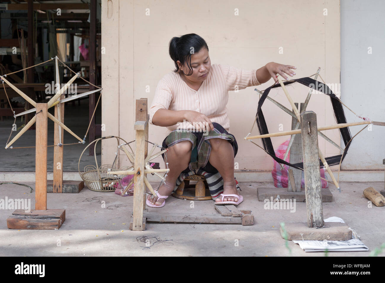 Traditional textile making at a village in Laos Stock Photo - Alamy