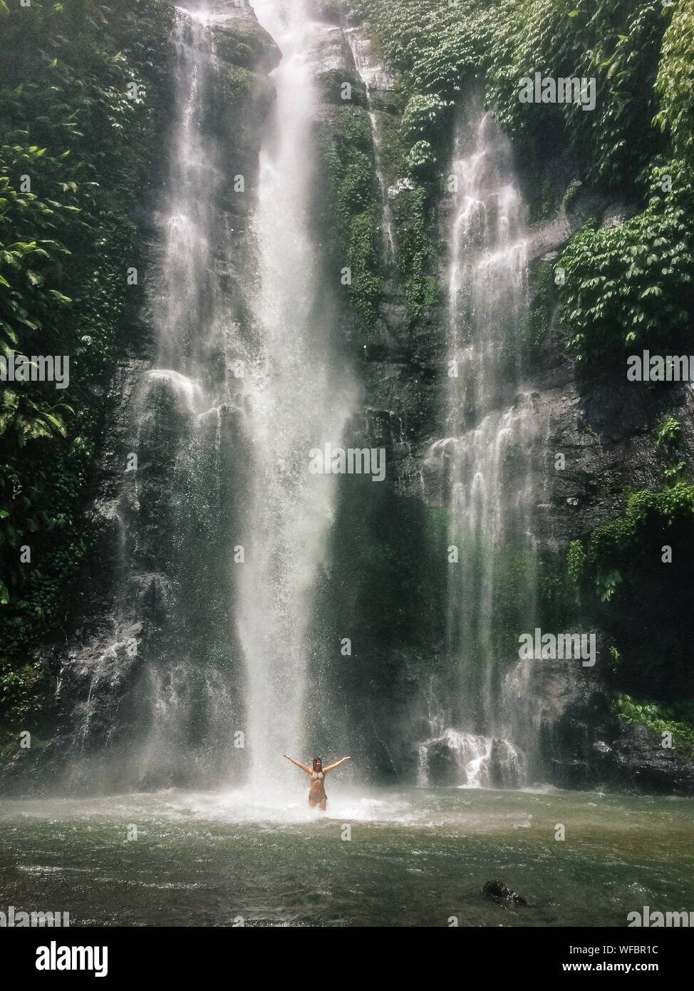 Waterfall woman arms High Resolution Stock Photography and Images - Alamy