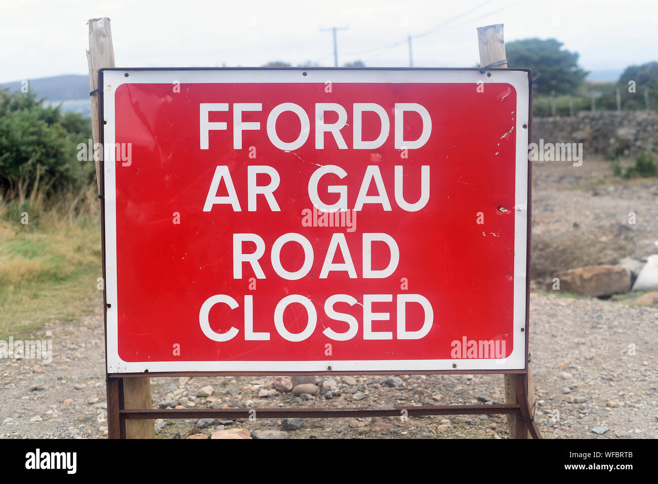 Welsh language Ffordd Ar Gau Road Closed sign. White on red background ...