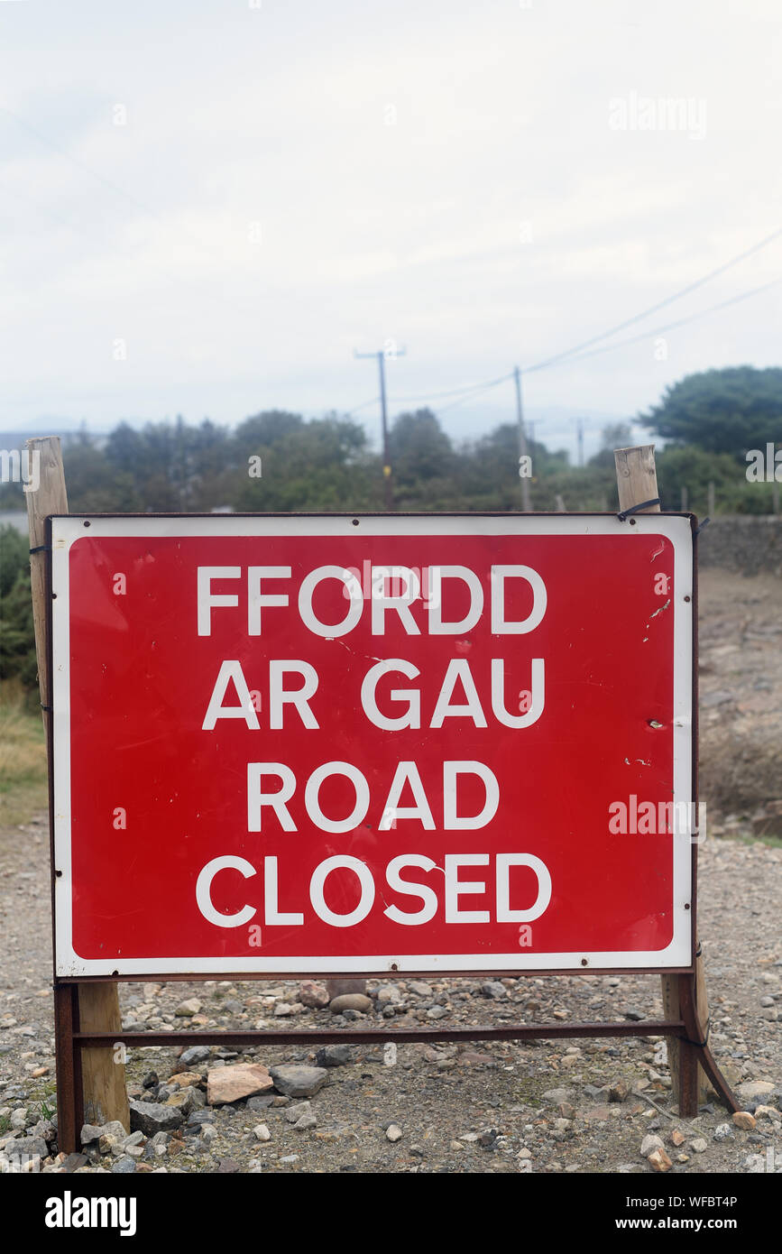 Welsh language Ffordd Ar Gau Road Closed sign. White on red background ...