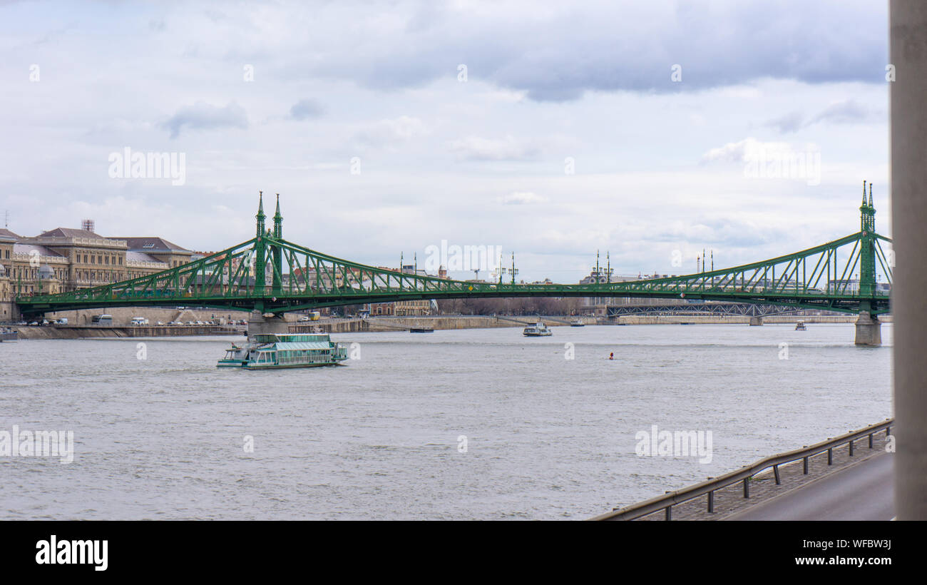 BUDAPEST, HUNGARY, 03 16 2019 the legenda ship passes along the Danube ... BUDAPEST, HUNGARY, 03 16 2019 the legenda ship passes along the Danube ...