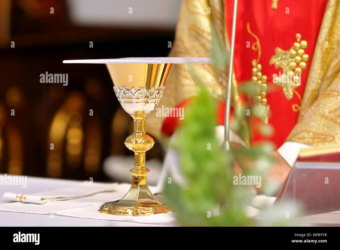 Priest celebrate mass at the church Stock Photo - Alamy