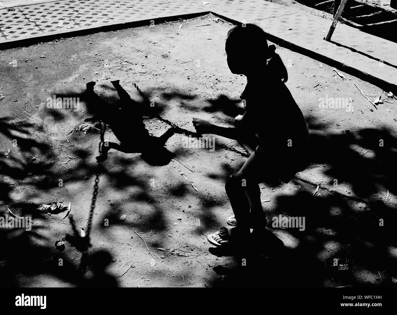 Girls in shadow playing hi-res stock photography and images - Alamy