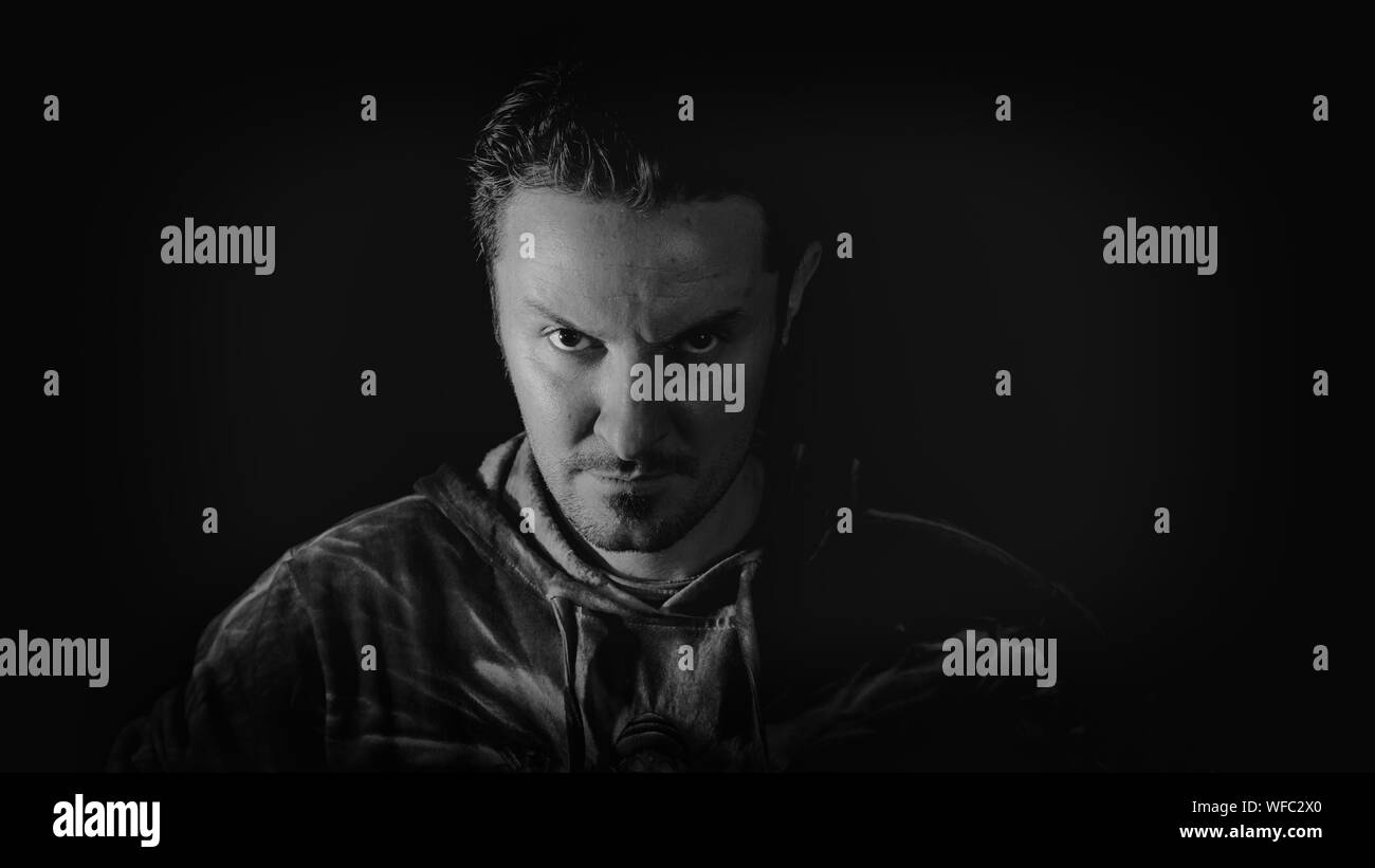 Black angry hi-res stock photography and images - Alamy