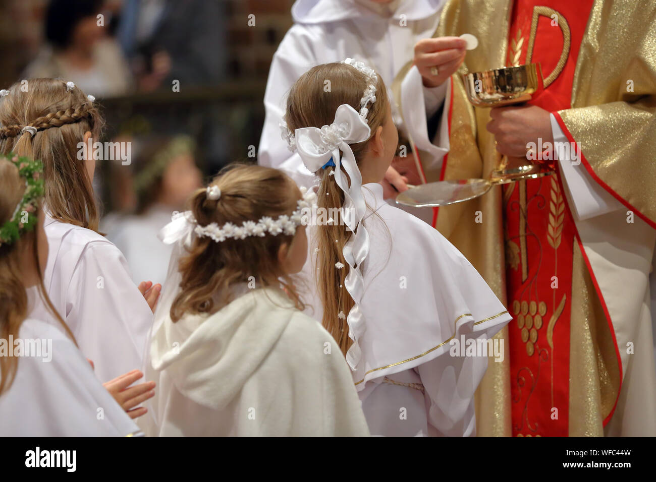 Children going to the first holy communion Stock Photo - Alamy