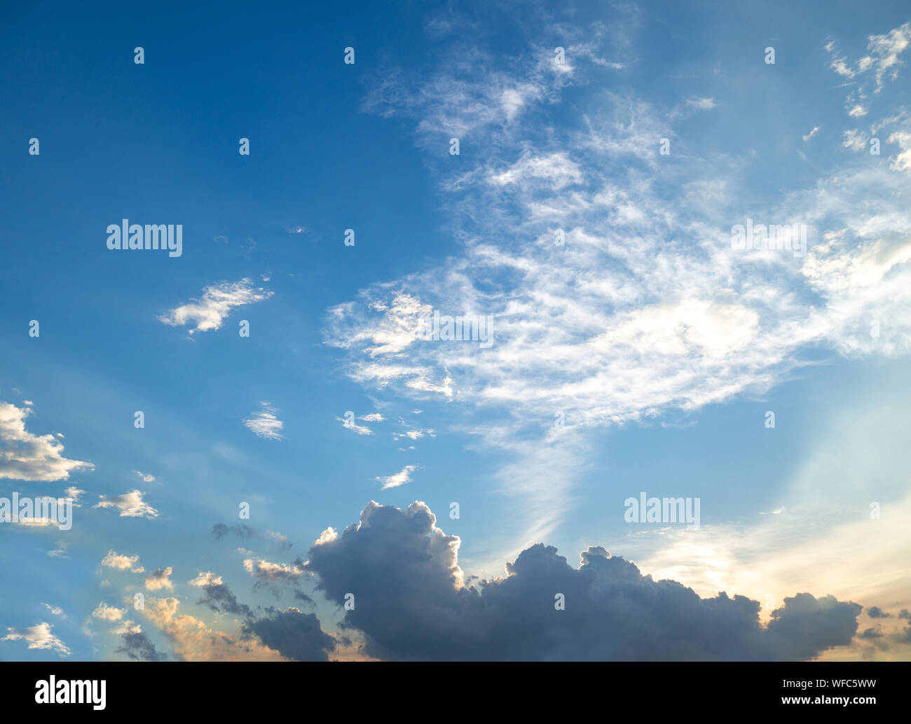 The sky at sunset, Sunny background, blue sky with white clouds ...