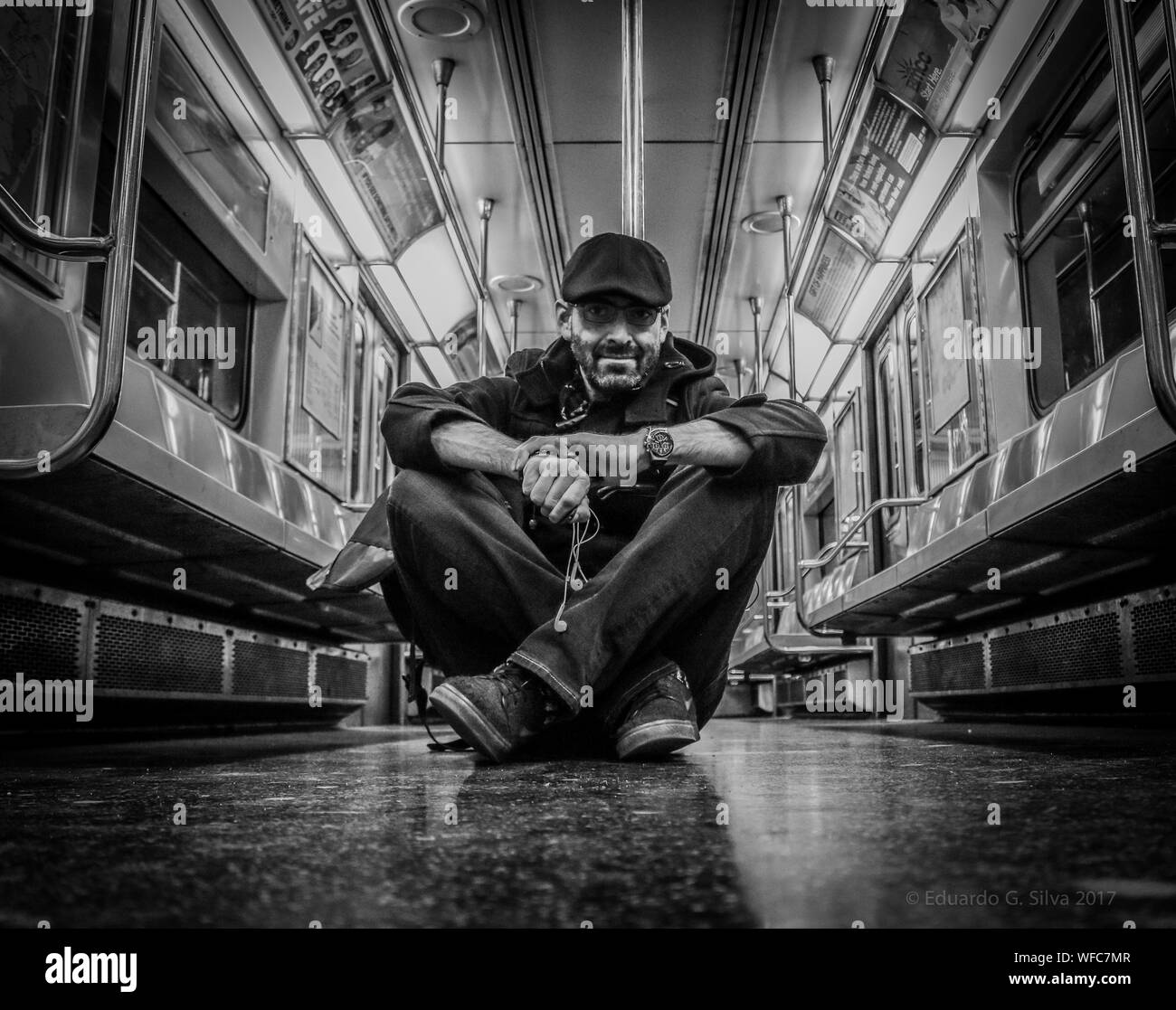 Man sitting train Black and White Stock Photos & Images - Alamy
