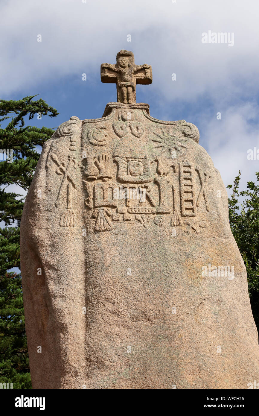 Menhir of Saint-Uzec. Menhir is about eight meters high and three ...