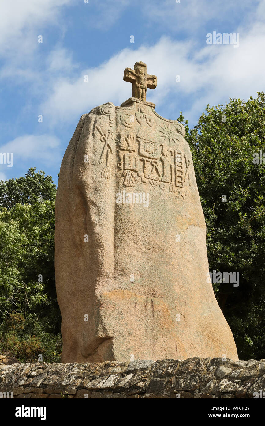 Menhir of Saint-Uzec. Menhir is about eight meters high and three ...