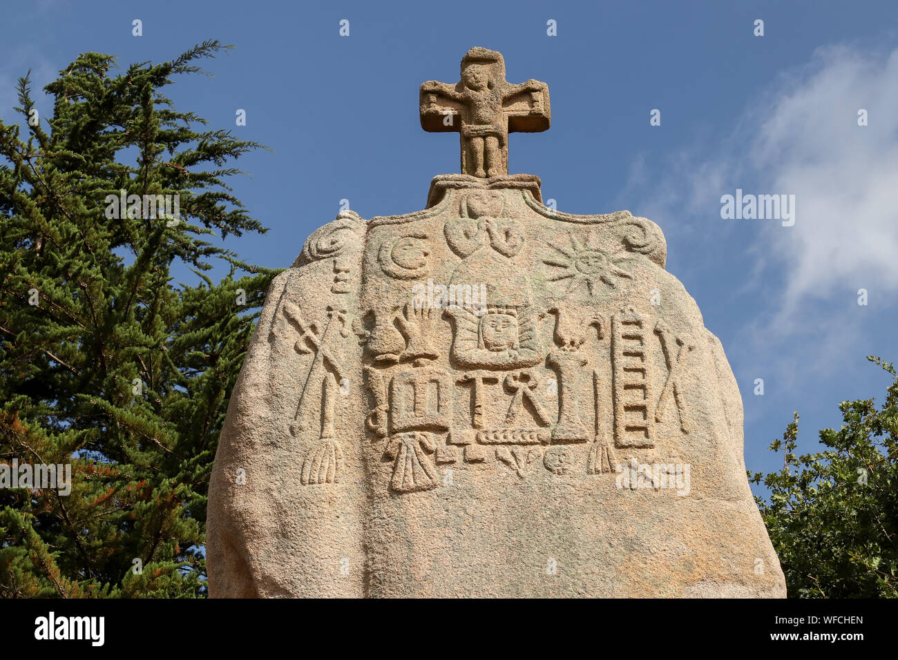 Menhir of Saint-Uzec. Menhir is about eight meters high and three ...