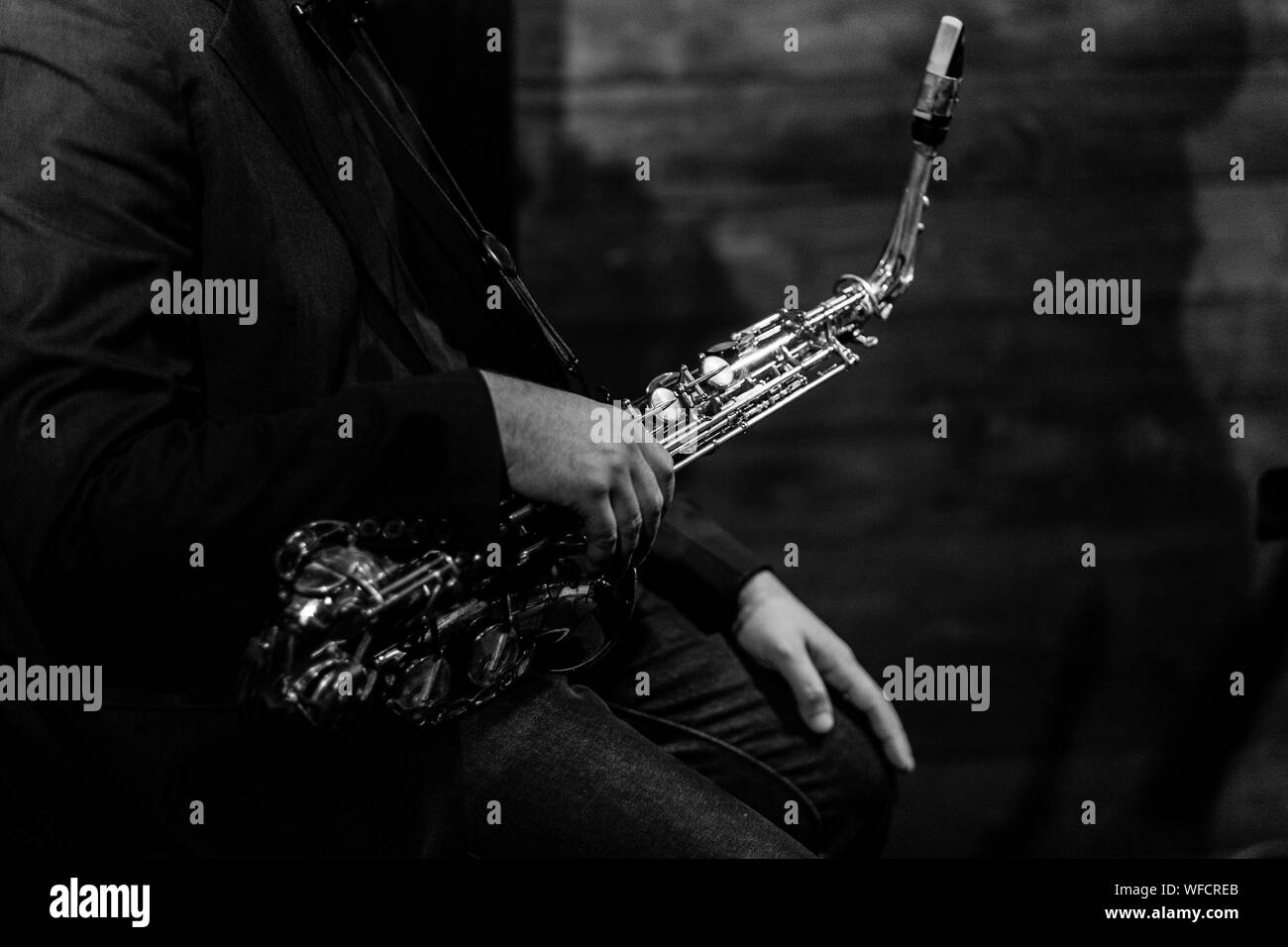 Man Holding Saxophone High Resolution Stock Photography and Images - Alamy