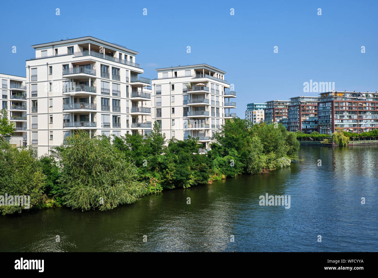 New apartment buildings at the waterfront of the river Spree in Berlin ...