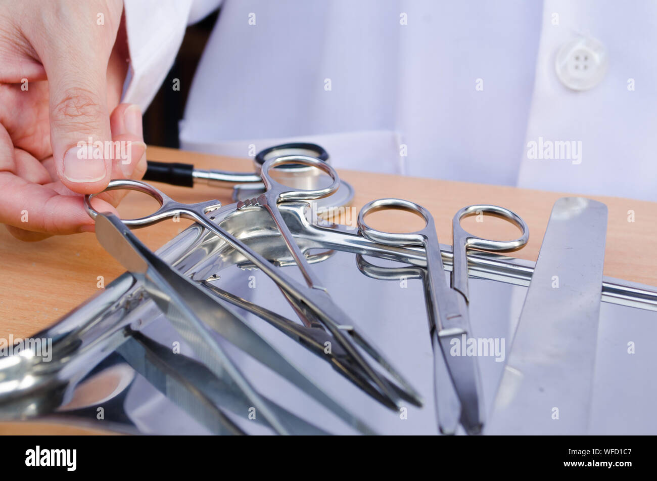Doctor scissors hi-res stock photography and images - Alamy