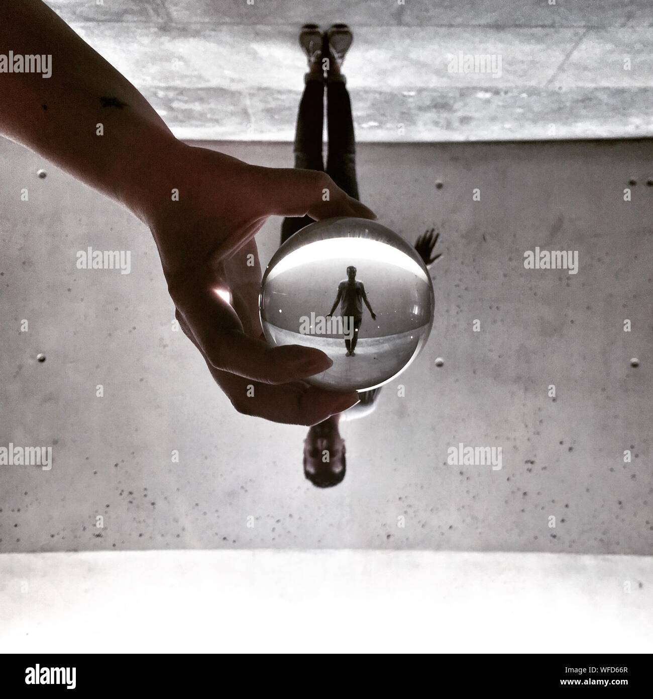 Man holding crystal ball hi-res stock photography and images - Alamy